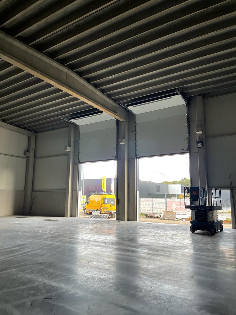 NL | Overheaddeuren geplaatst AMT Group Breda